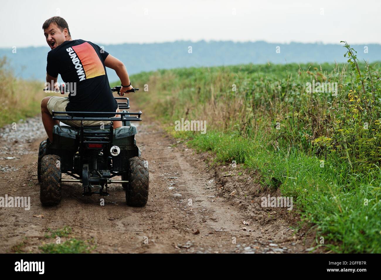 Man driving four wheeler hi-res stock photography and images - Alamy