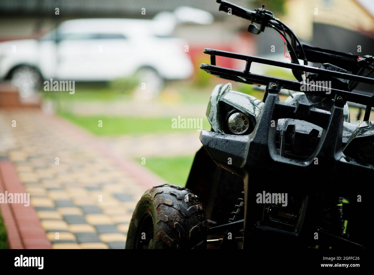 Four-wheller ATV quad bike in home use Stock Photo - Alamy