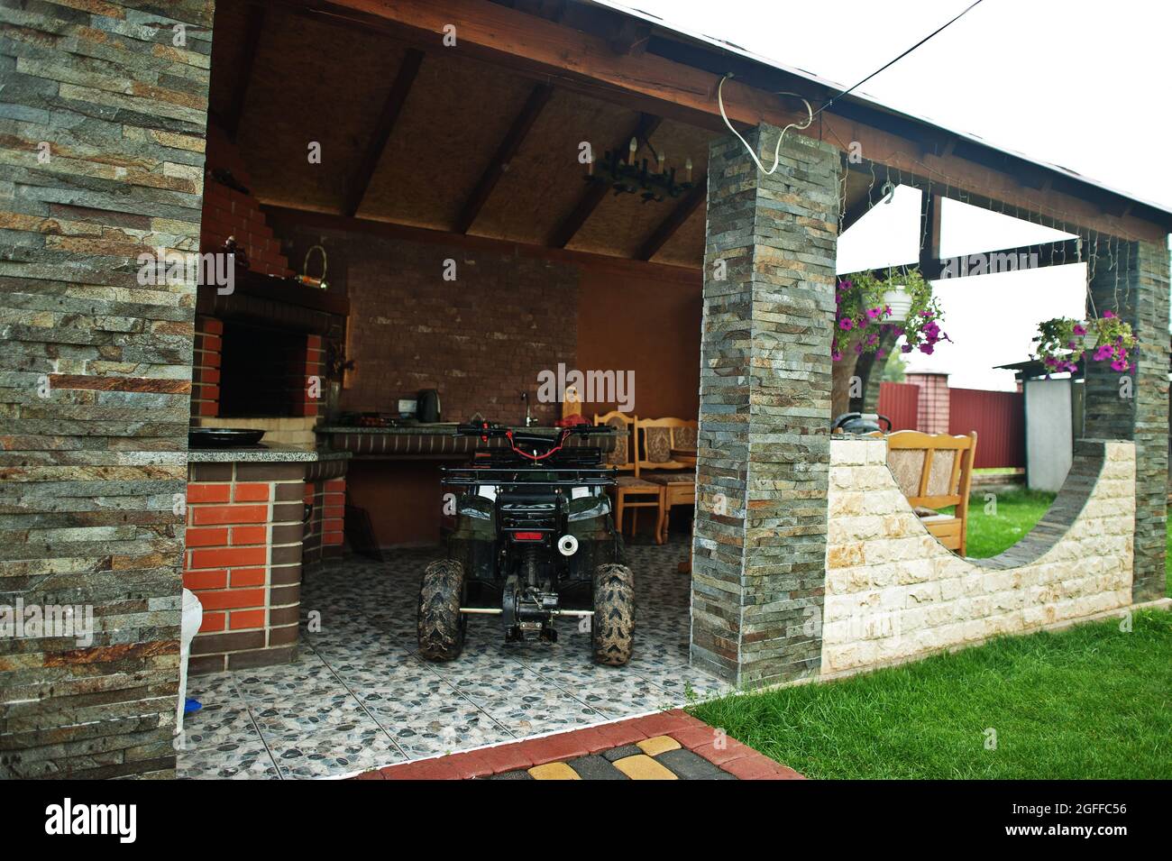 Four-wheller ATV quad bike in home use Stock Photo - Alamy