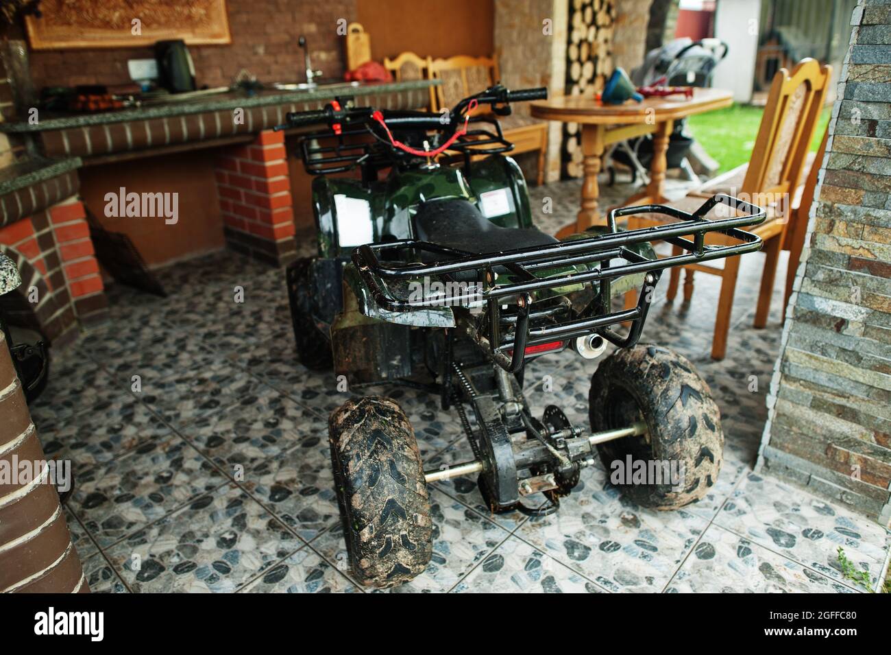 Four-wheller ATV quad bike in home use Stock Photo - Alamy
