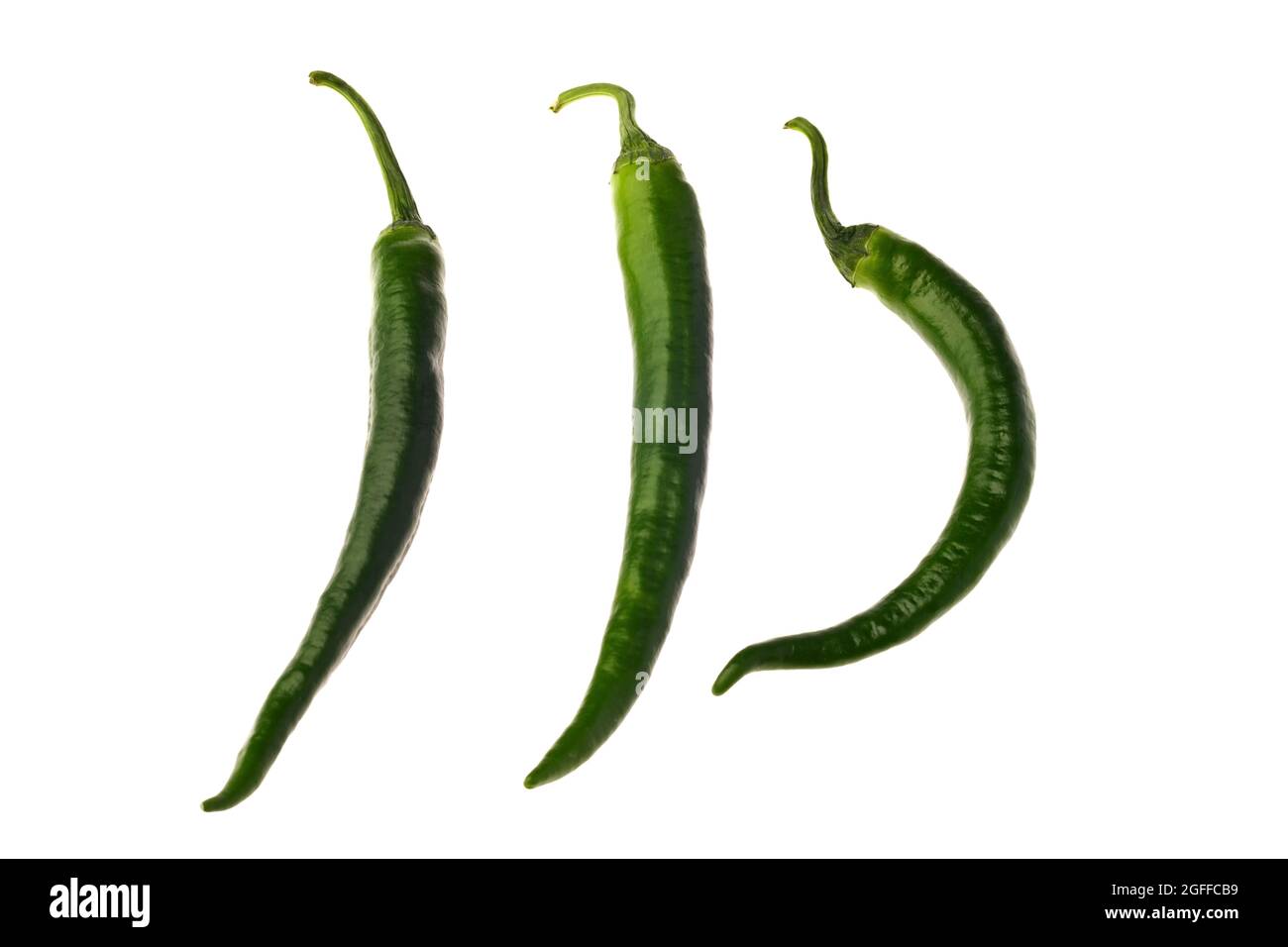 three green chili pepper isolated on white background Stock Photo - Alamy