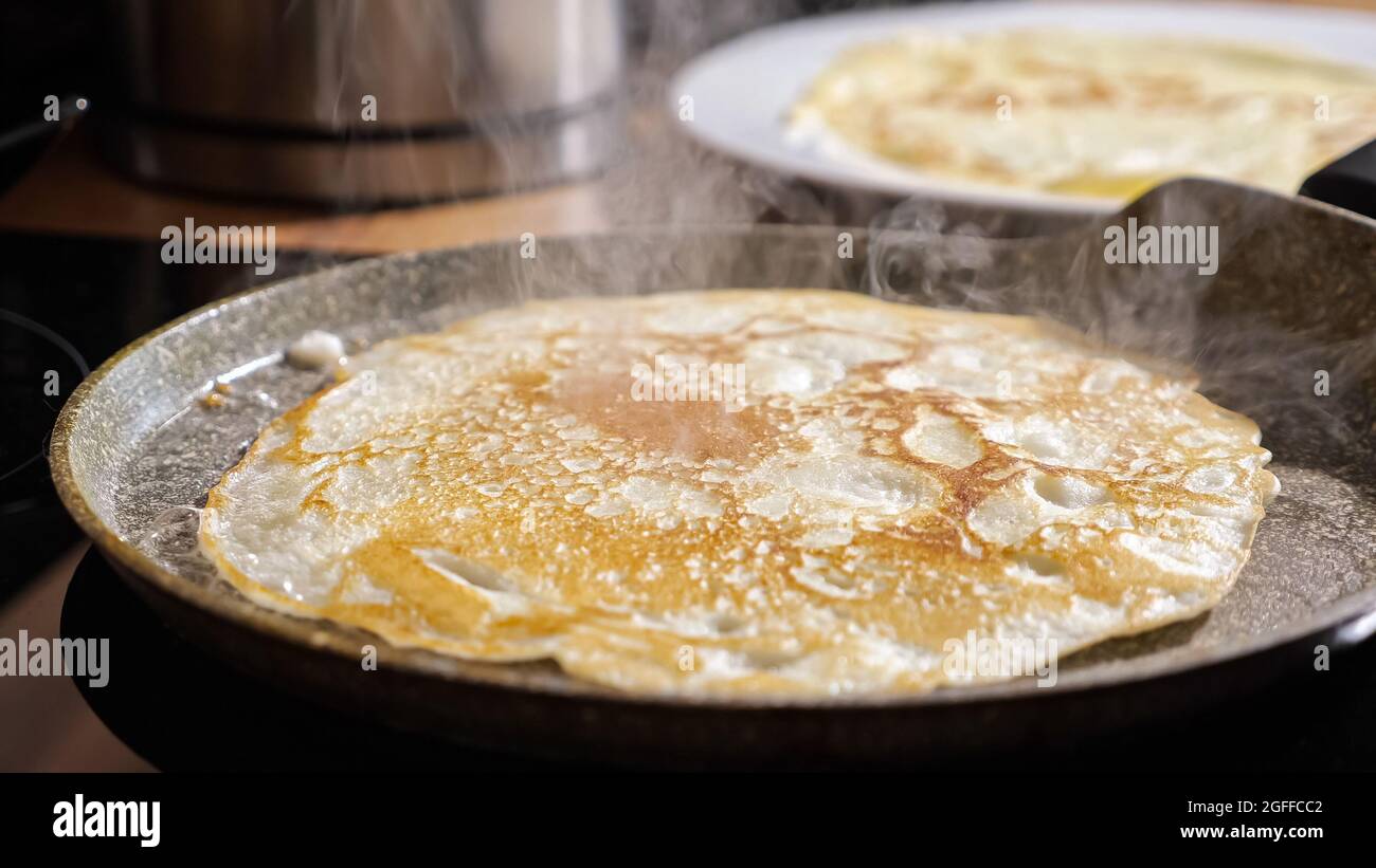 Preparing round frying pan cooking hi-res stock photography and images ...