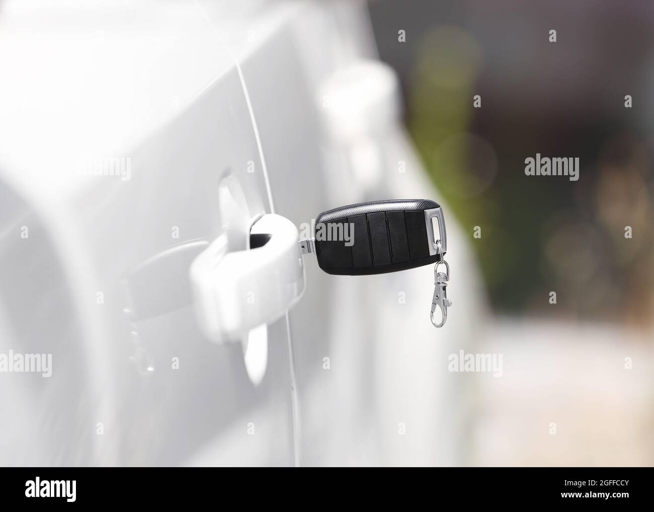 Car key in lock of door Stock Photo - Alamy