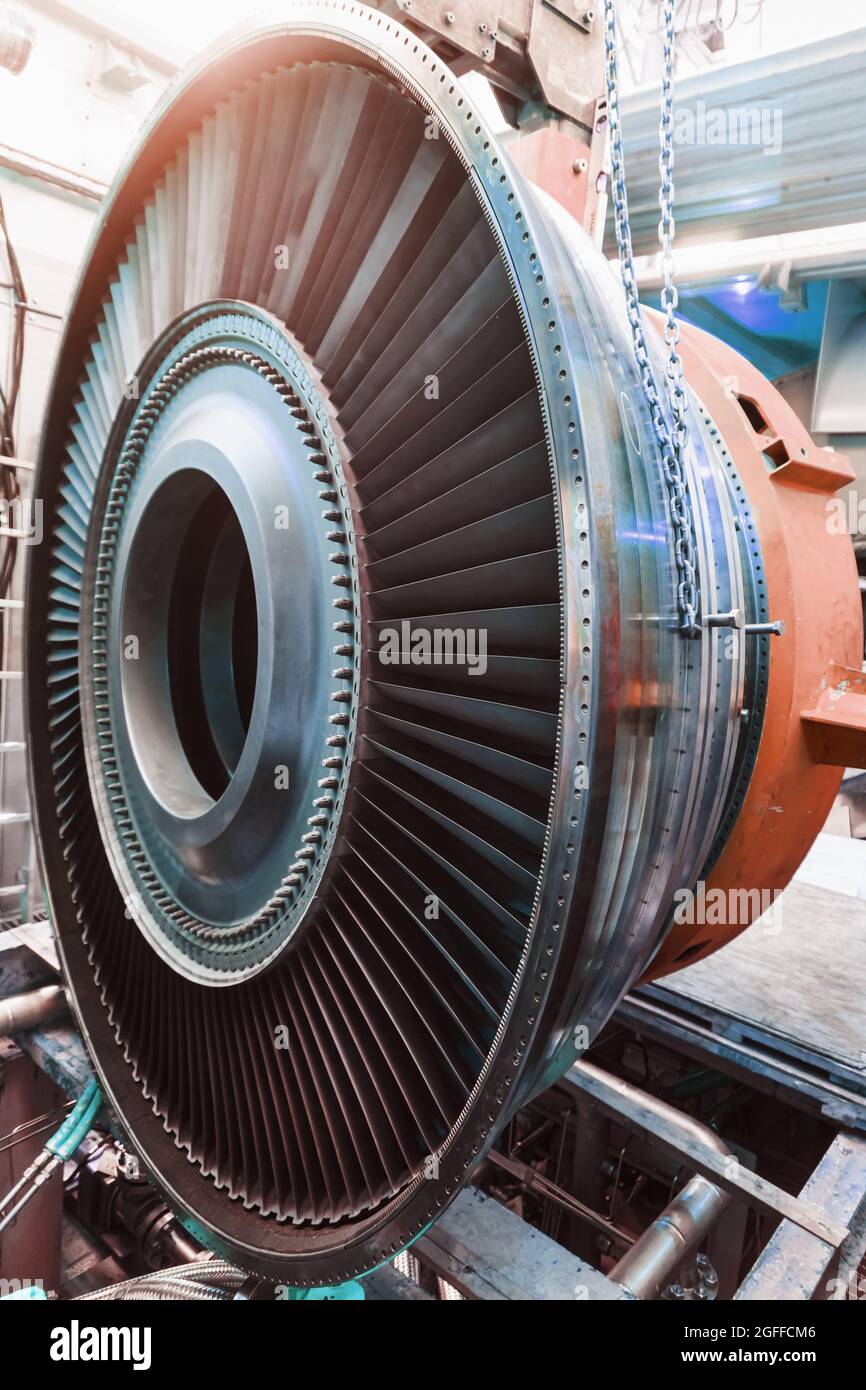Disassembled gas turbine for power generation. Details of rotor blades ...