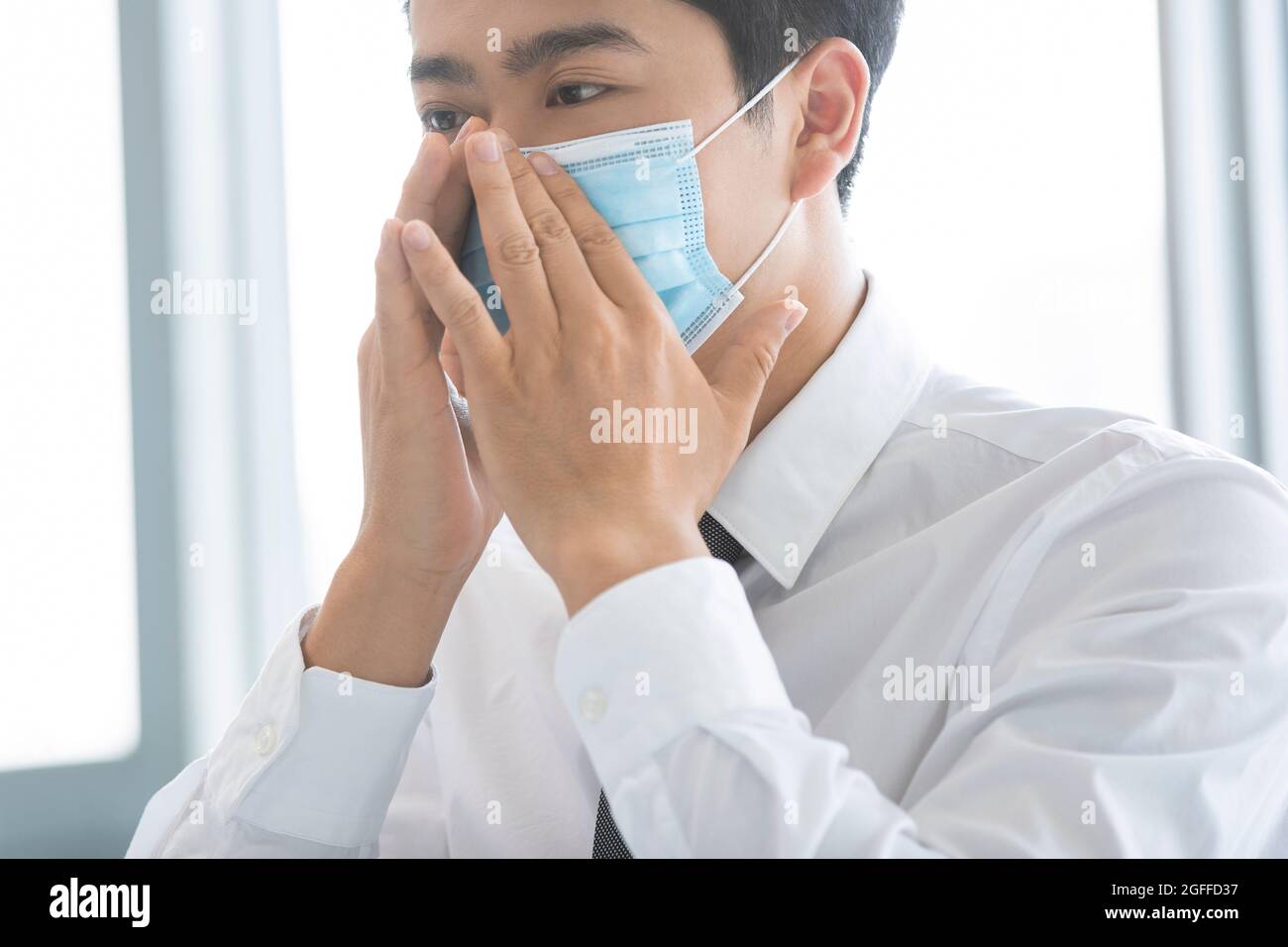 Businessman wearing surgical mask hi-res stock photography and images ...