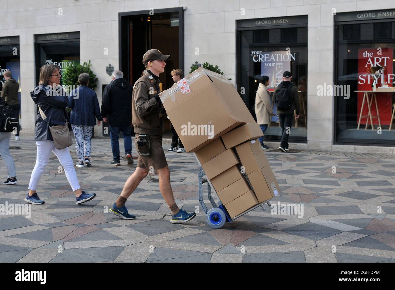 Copenhagen, Denmark., 25 August 2021, American ups delivery man wih ...