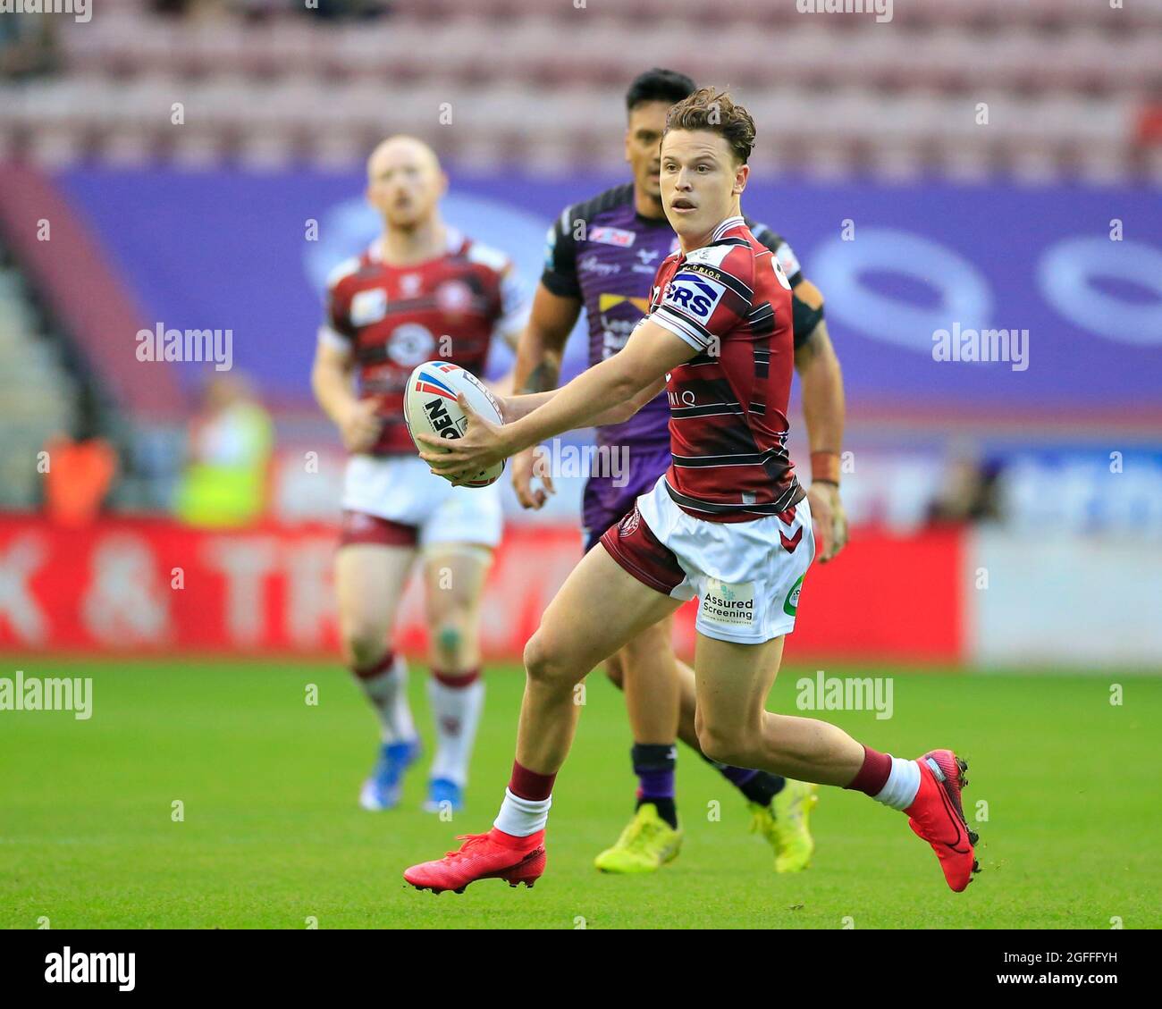 Jai Field (6) of Wigan Warriors looks for a pass Stock Photo - Alamy