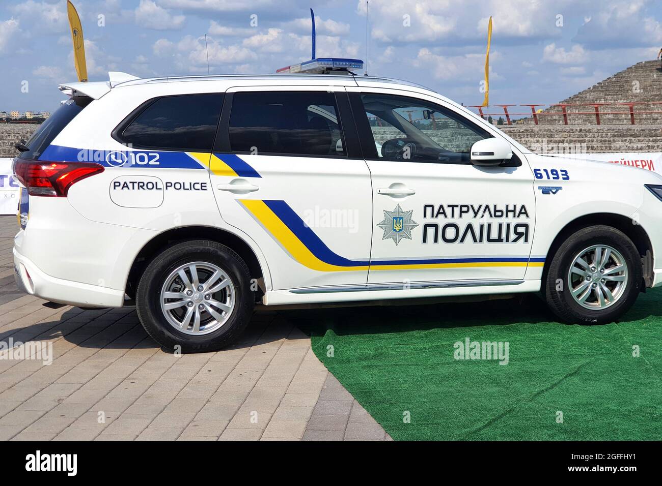 A police patrol car with police call number stands on the street of a ...