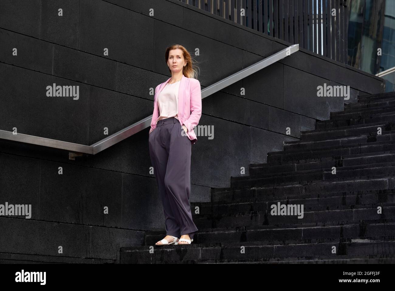 Young serious beautiful blonde millennial woman Stock Photo - Alamy