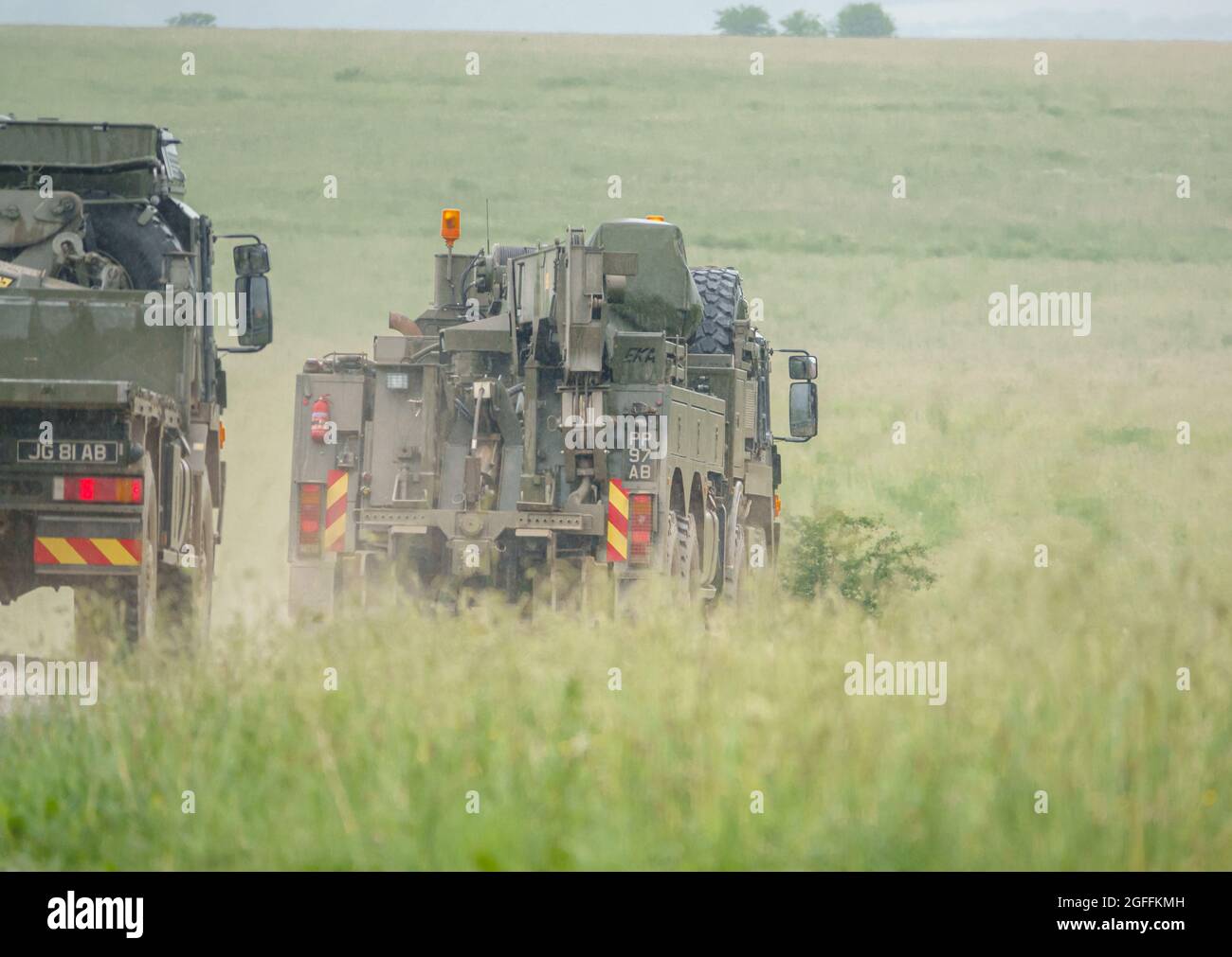 MAN SX45 32.430 RHD 8x8 Recovery Truck followed by MAN SV 4x4 kicking ...