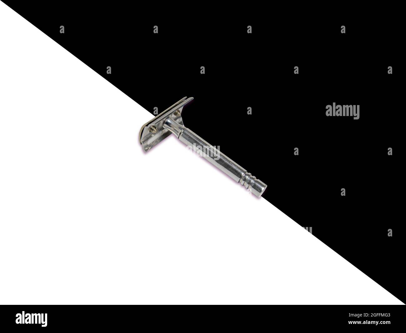 Vintage shaving razor isolated on a black and white background ...