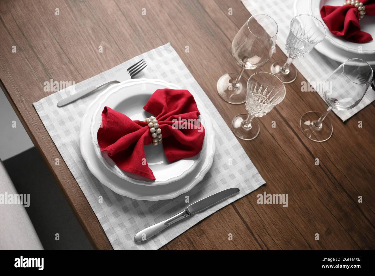 Elegant table appointments with red napkin Stock Photo - Alamy