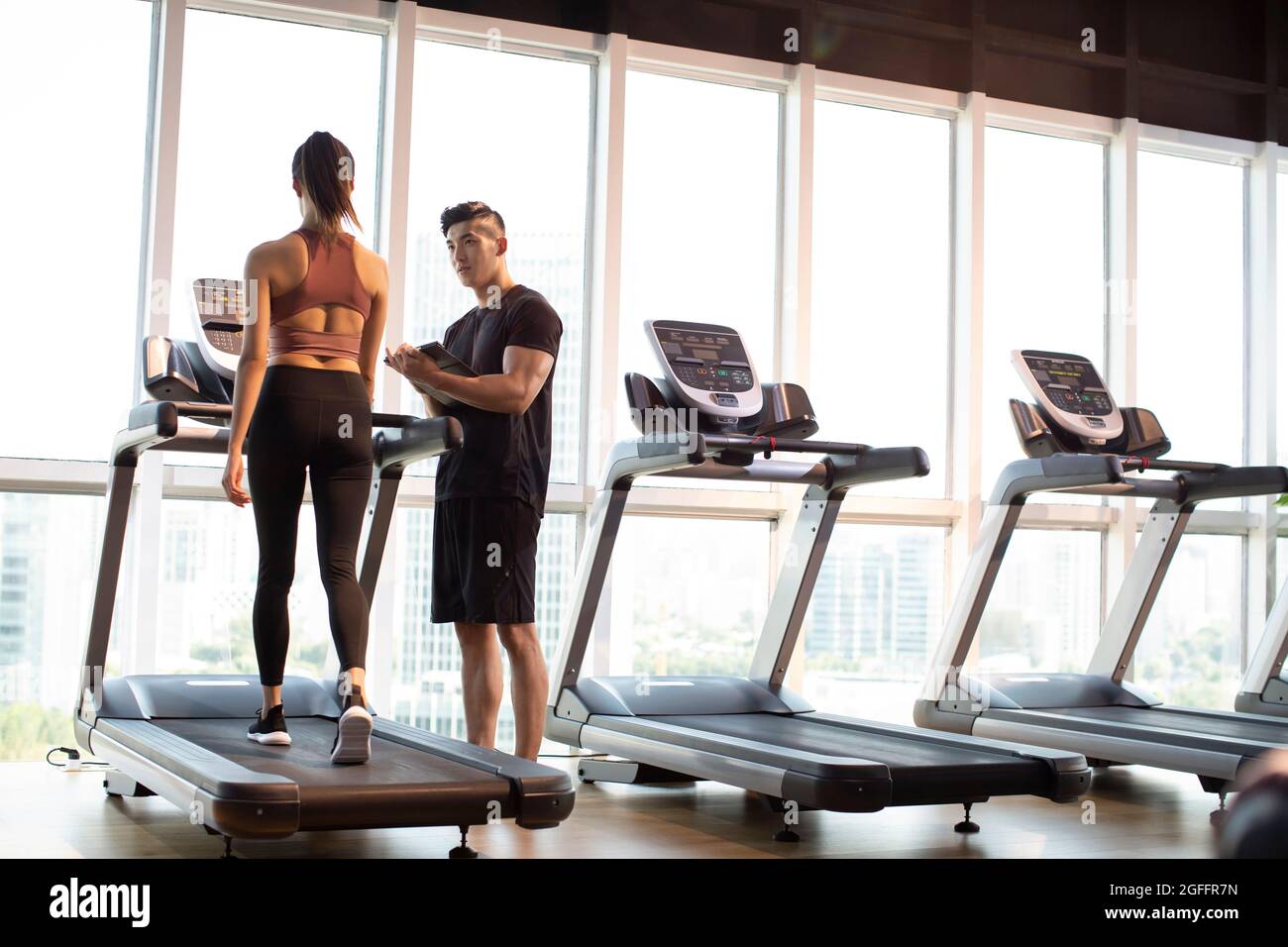 Back view personal trainer hi-res stock photography and images - Alamy