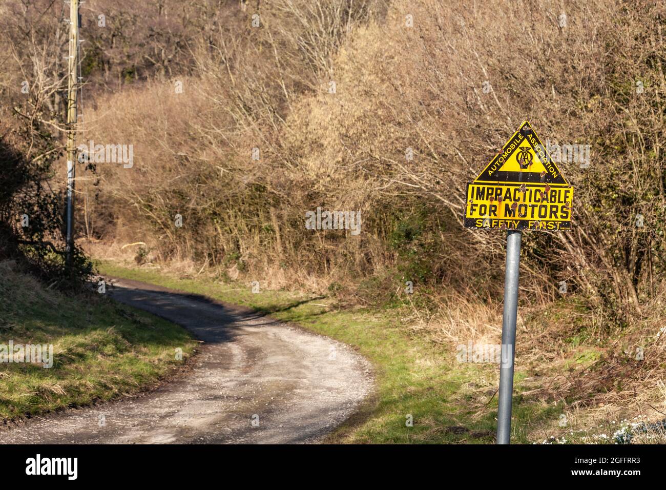 Old AA automobile association safety warning sign by narrow country ...