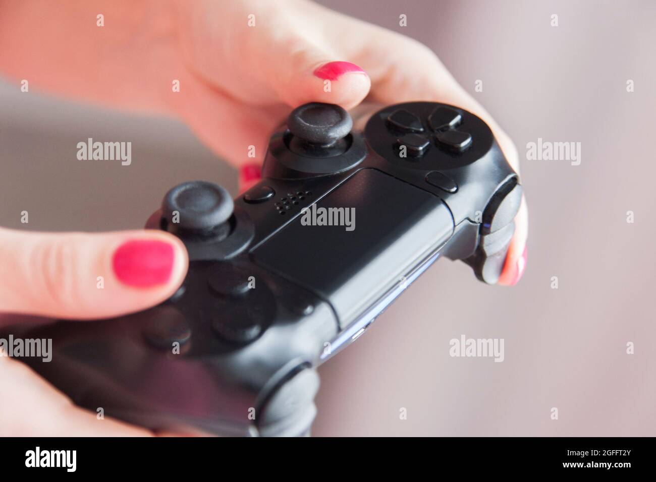 Female gamepad hi-res stock photography and images - Alamy