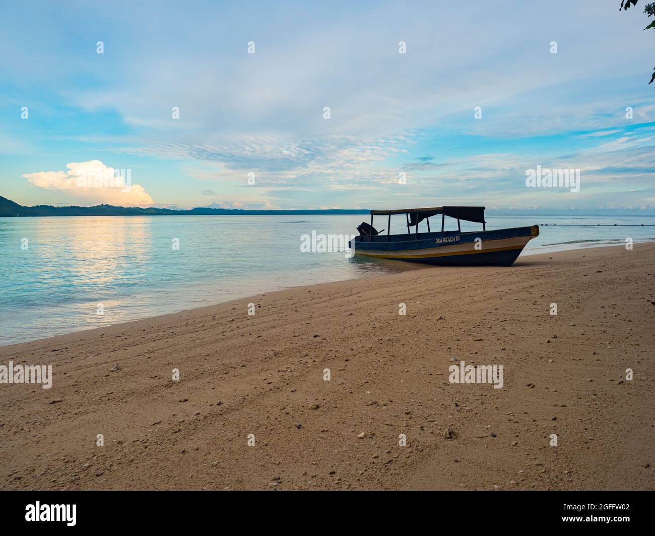 Ora Beach, Indonesia - Feb, 2018: Boat and beautiful sandy beach, Seram ...