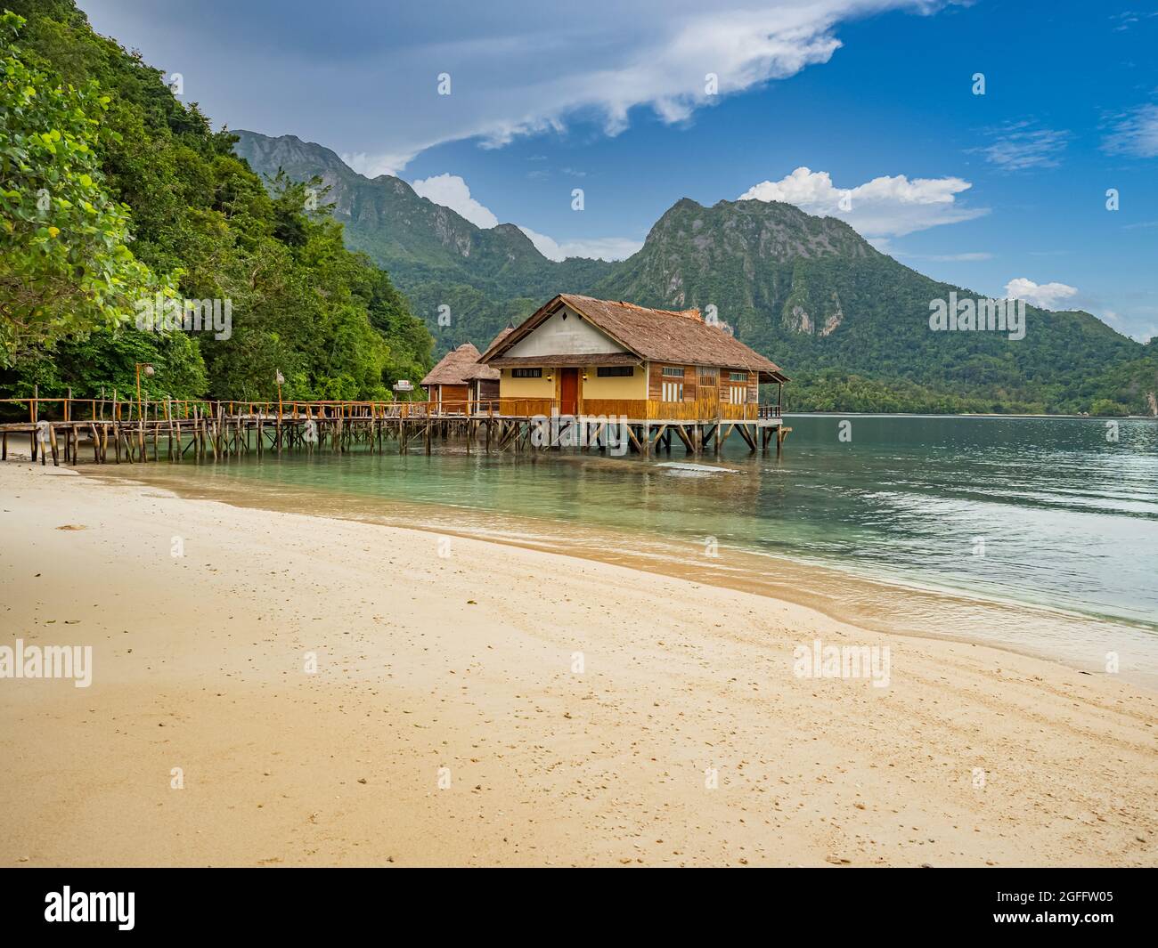 Ora Beach, Indonesia - Feb, 2018: Houses on the water in Ora Beach ...