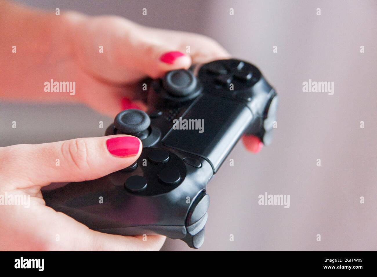Female gamepad hi-res stock photography and images - Alamy