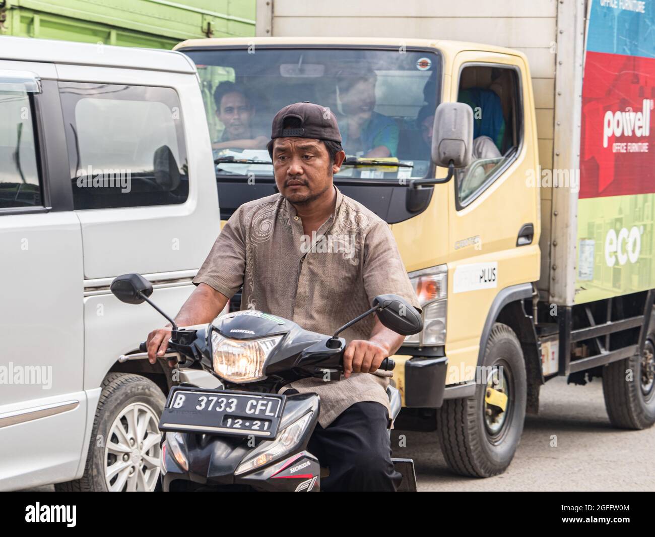 Jakarta, Indonesia - February 20, 2018: Local people on the street of ...