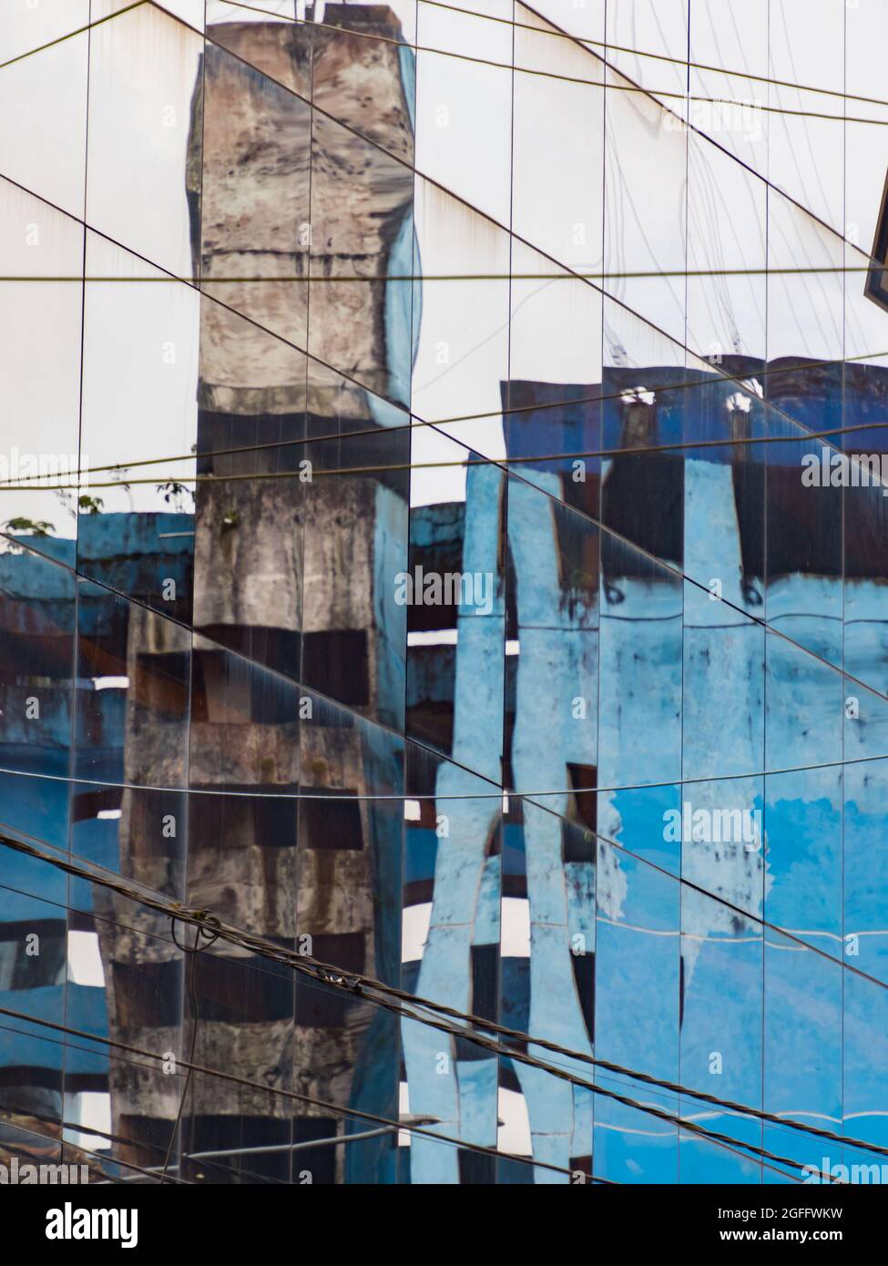 Iquitos, Peru - Dec,2019: The abandoned, unfinished, blue building is ...