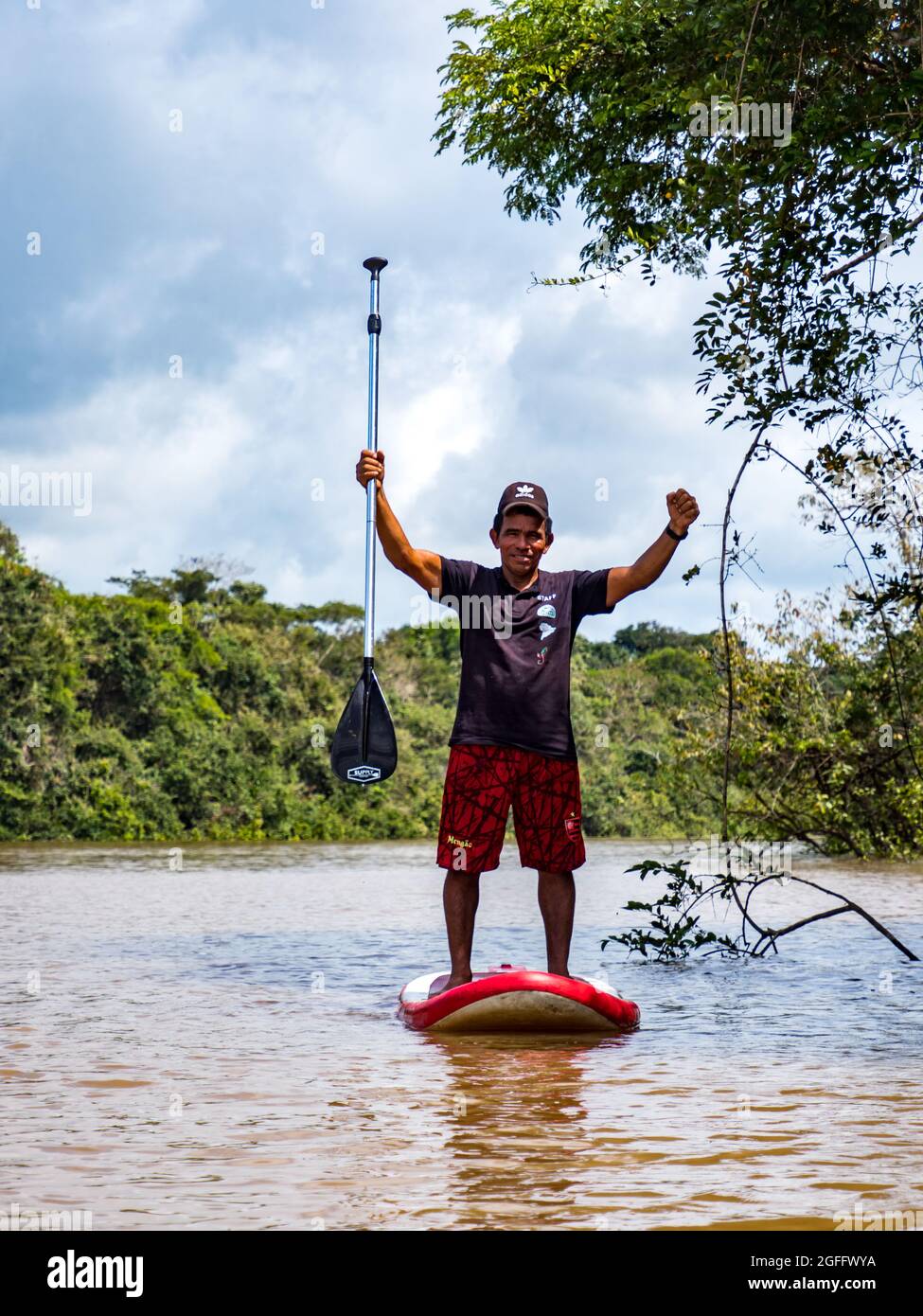 Laguna Onza, Brazil - Dec 2019: Portrait of a man floating on water on ...