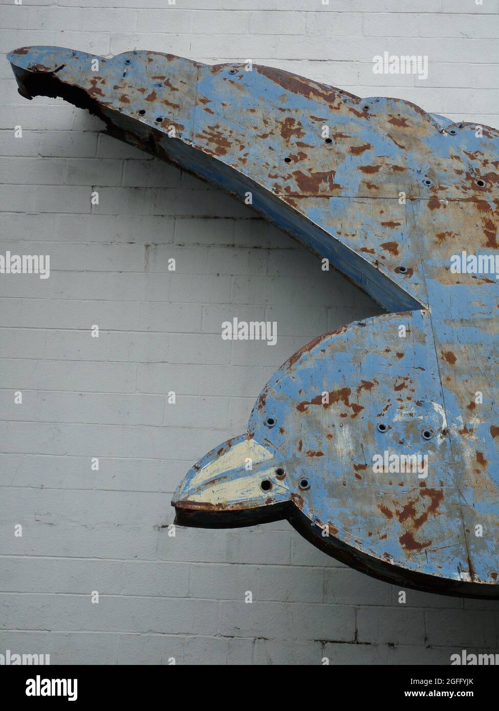 Vintage blue bird figural sign Stock Photo - Alamy