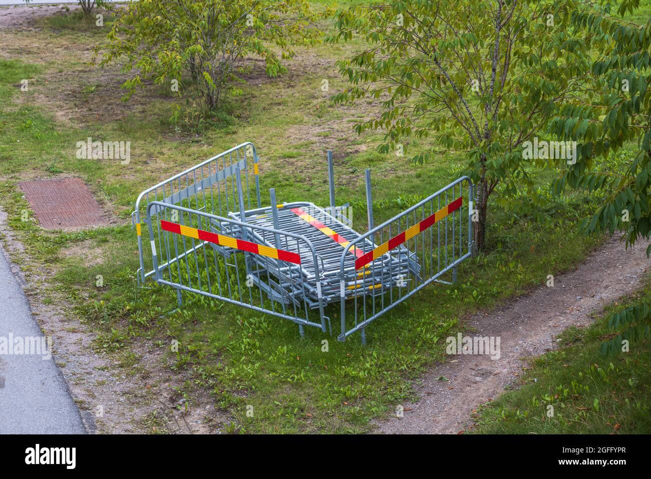Metal facing part gathered on side of road. Renovation work and safety ...