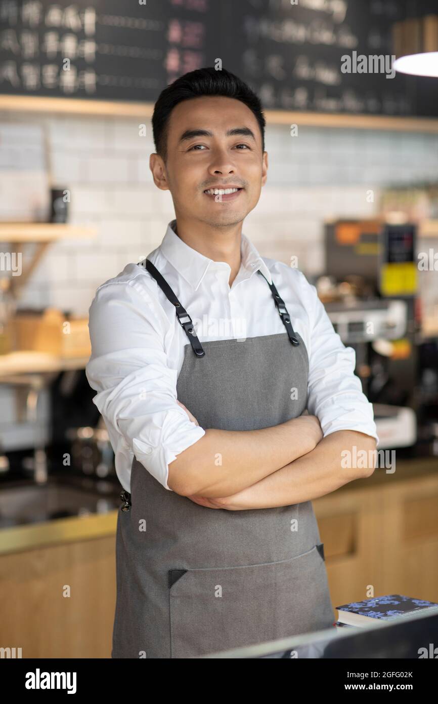 Portrait of coffee shop owner Stock Photo - Alamy