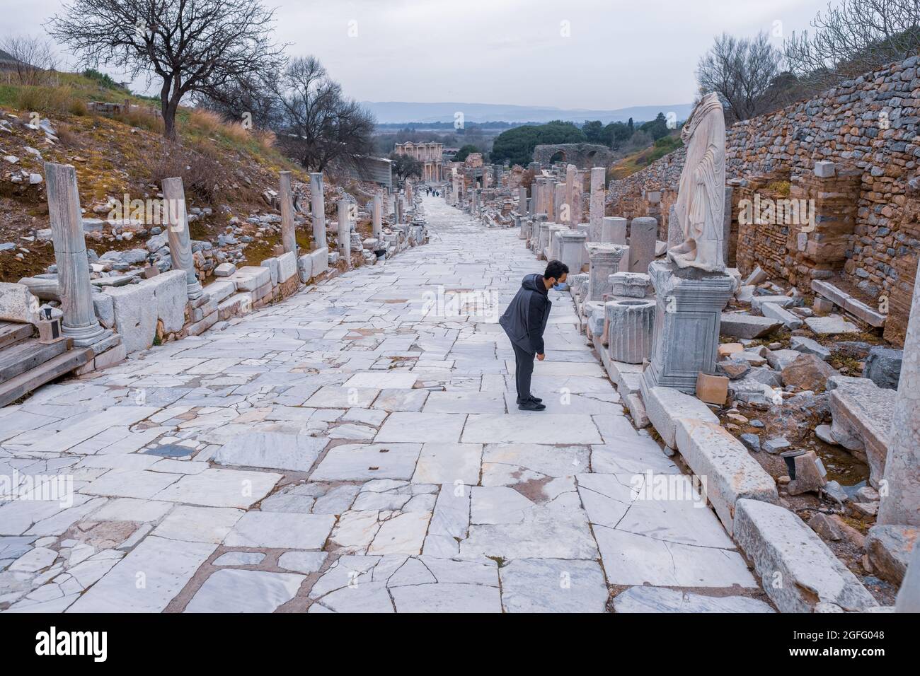 Selcuk, Izmir, Turkey - 03.09.2021: one man with mask looking at ...