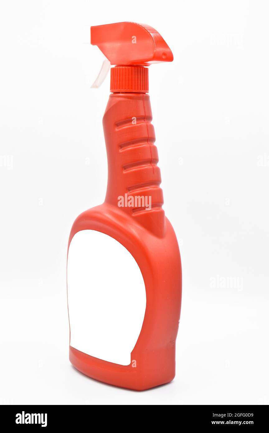 Red colored plastic spray detergent bottle. Cosmetic, container ...