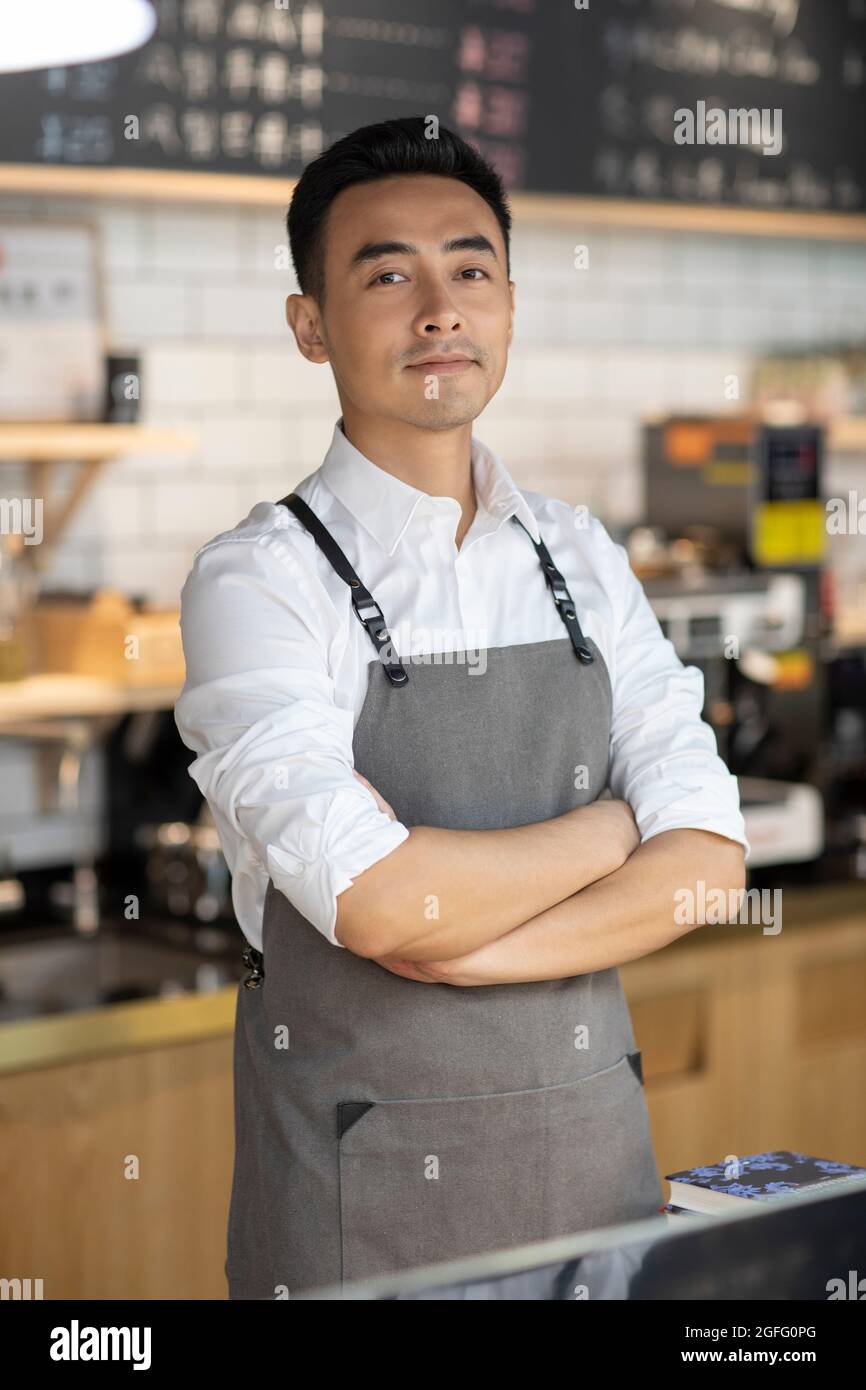 Portrait of coffee shop owner Stock Photo - Alamy