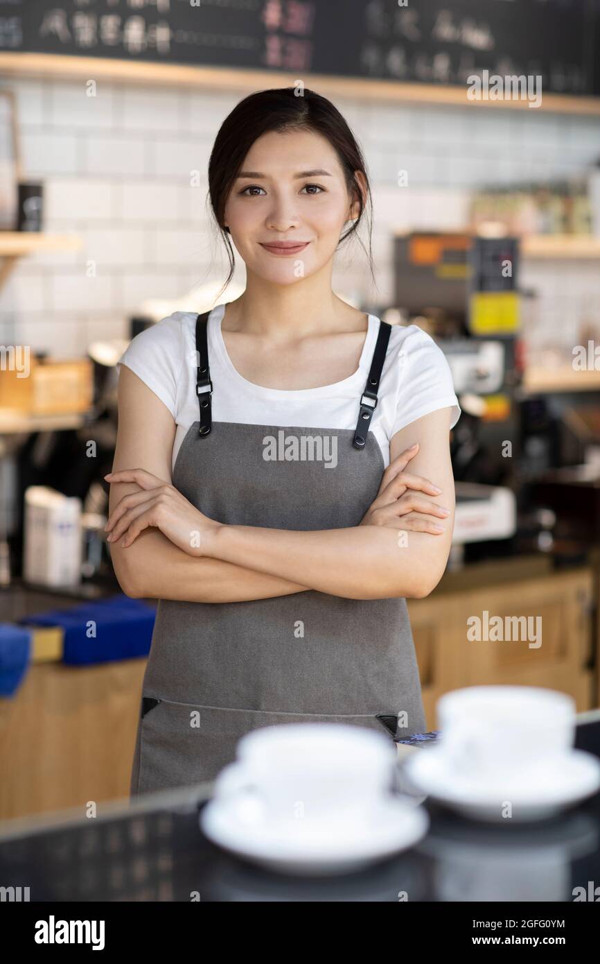 Portrait of coffee shop owner Stock Photo - Alamy