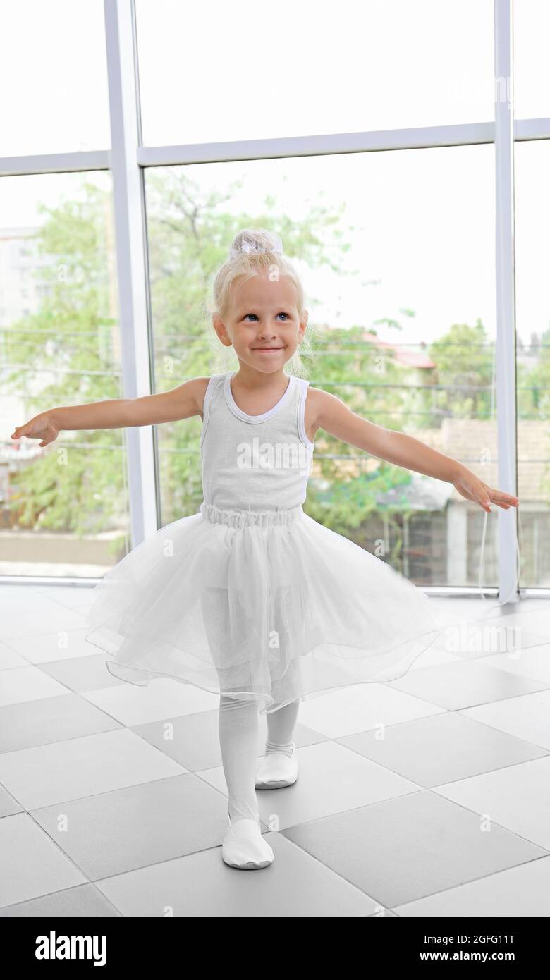 Cute little girl practicing ballet Stock Photo - Alamy