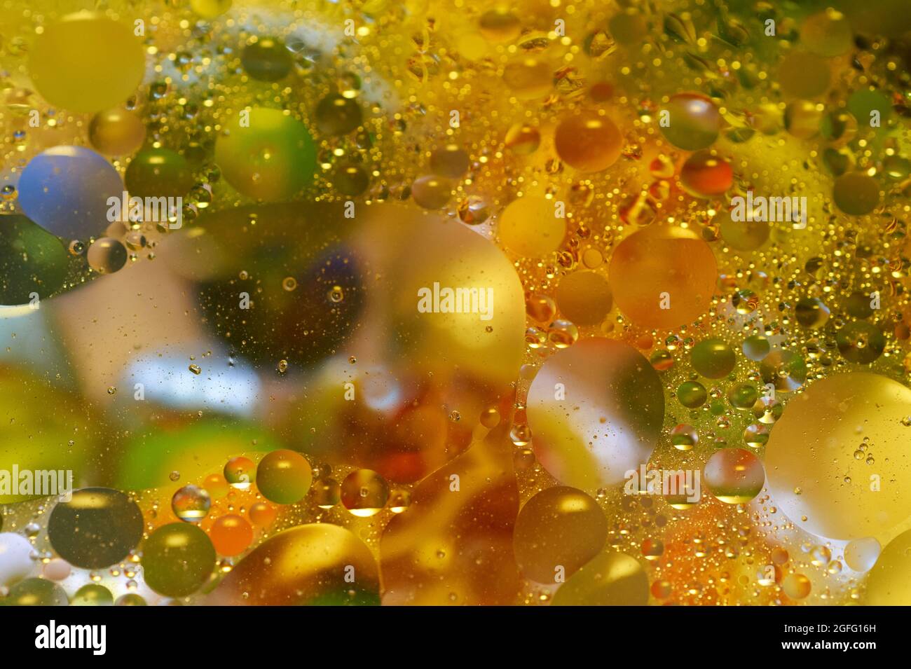 floating in the water abstract colorful oil drops Stock Photo - Alamy