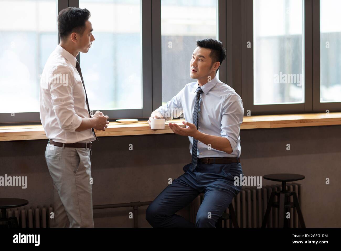 Two white men talking cafe hi-res stock photography and images - Alamy