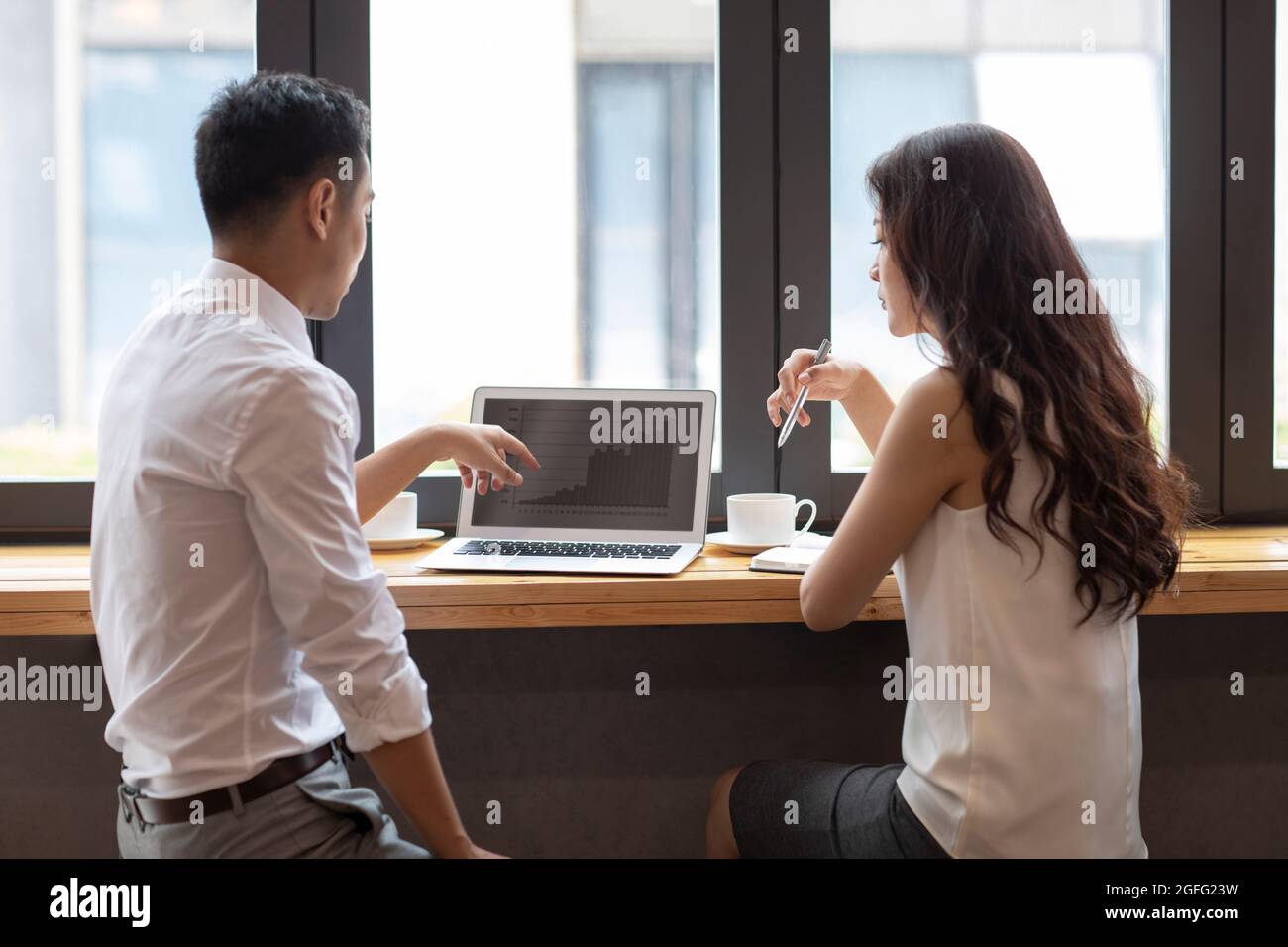 Business people talking in café Stock Photo - Alamy