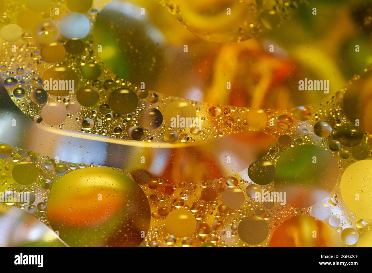 floating in the water abstract colorful oil drops Stock Photo - Alamy