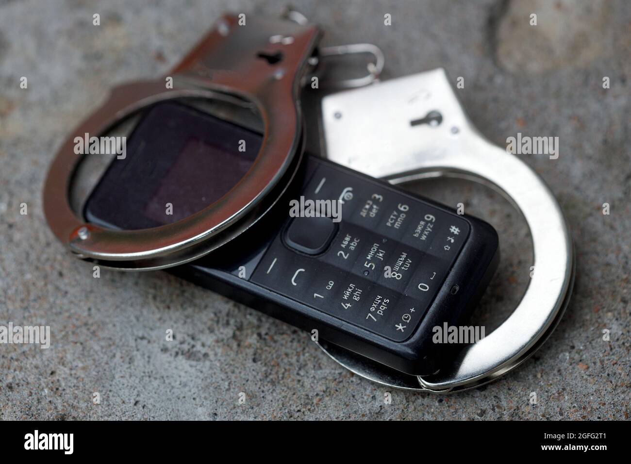 Prison and cell phone hi-res stock photography and images - Alamy
