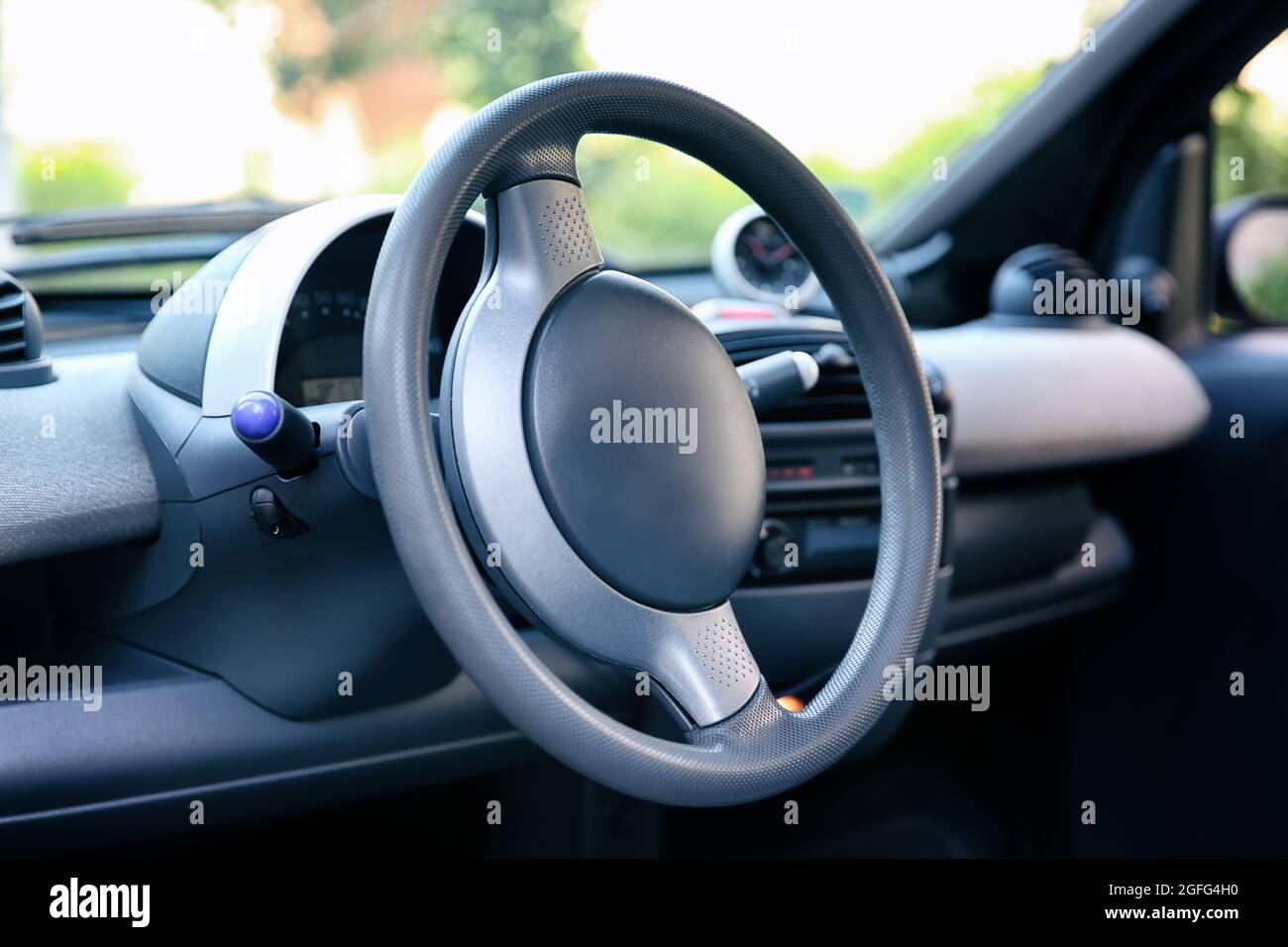 Steering wheel, closeup Stock Photo - Alamy