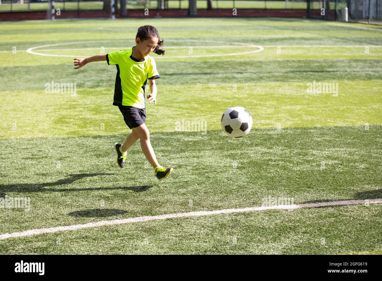 Little Girl Playing Football at Margaret Carlin blog