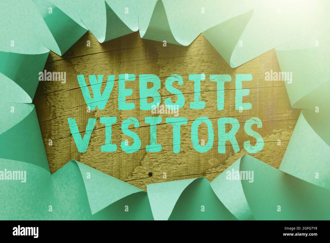 Hand writing sign Website Visitors. Word Written on someone who visits ...
