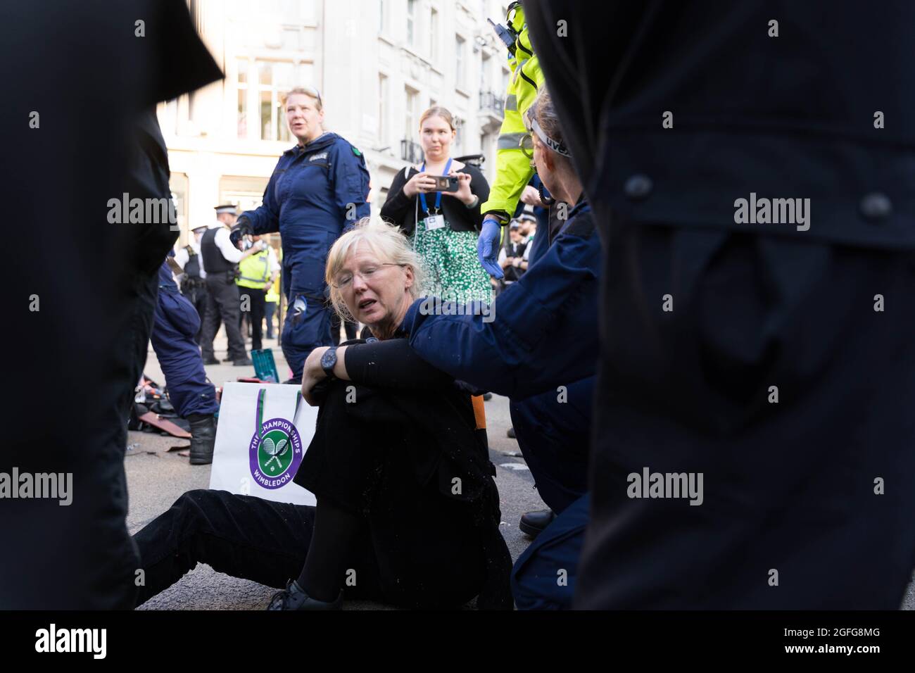 Oxford Circus, London, UK. 25th August 2021. Climate change protesters ...