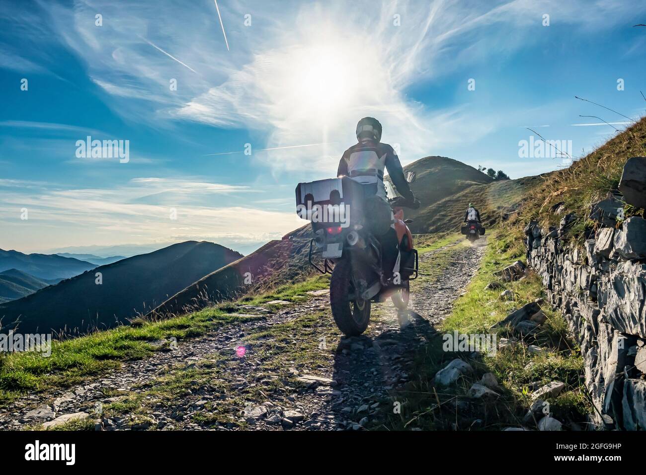 Motorbyke travel in the alps Stock Photo - Alamy