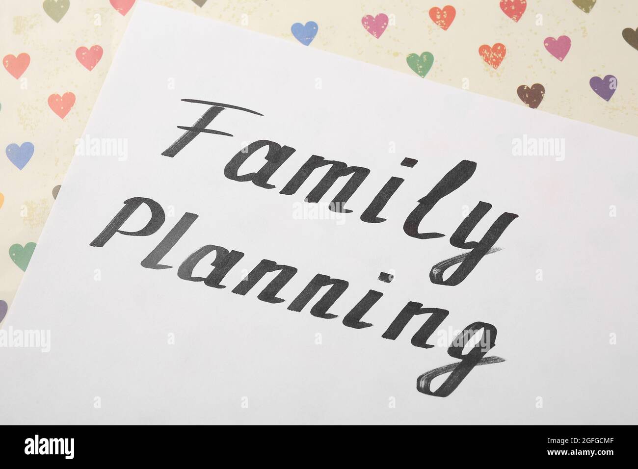 Paper sheet with words Family planning, close up Stock Photo - Alamy