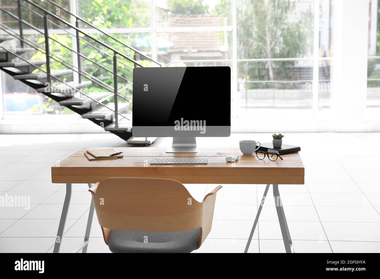 Working place on window background Stock Photo - Alamy