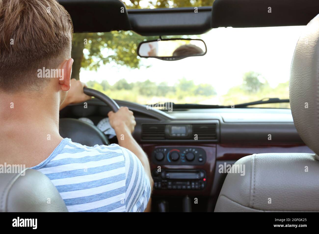 Man driving car Stock Photo - Alamy