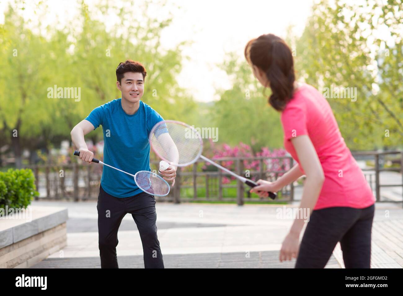 Two women playing badminton park hi-res stock photography and images ...