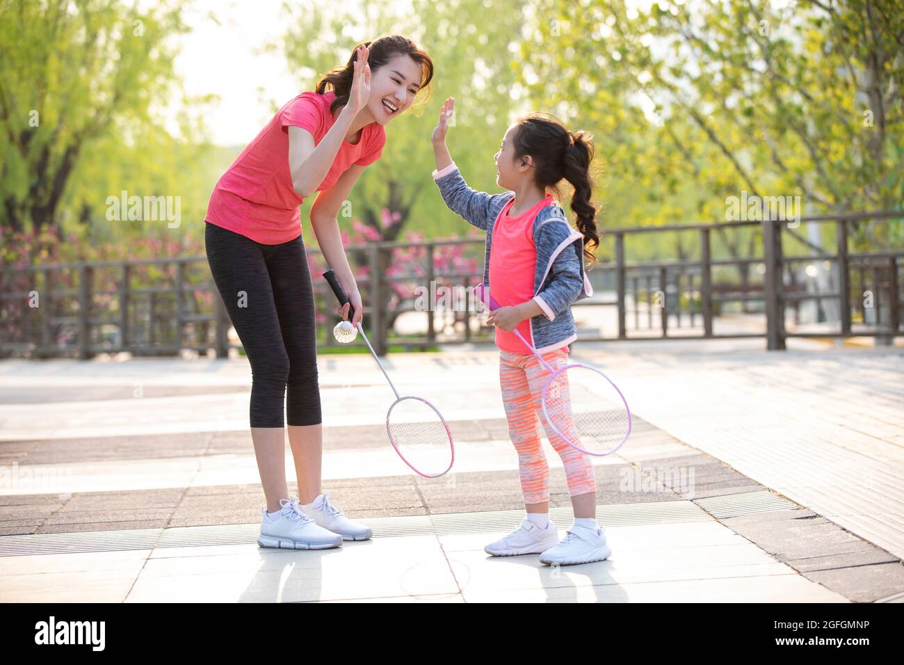 Girls playing badminton park hi-res stock photography and images - Alamy
