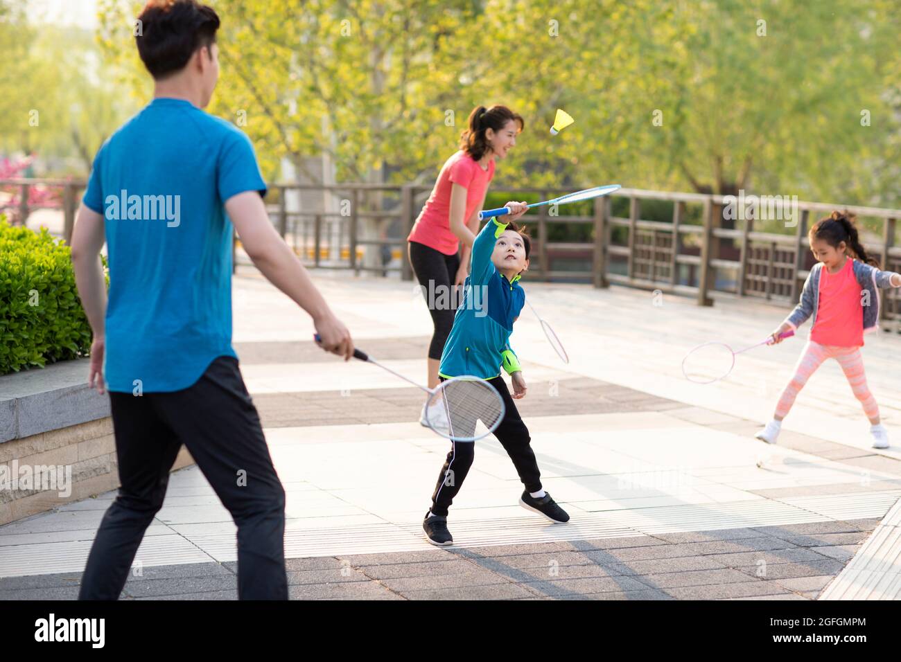Family Playing Badminton