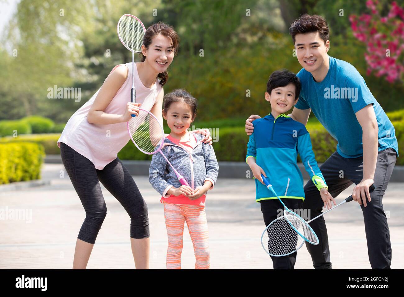 Family Playing Badminton